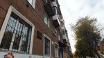 Здесь жил герой Советского Союза В.Н. Исайченко (Moskovskaya ulitsa No:40), anıt levhası, anıt taş  Yurga'dan