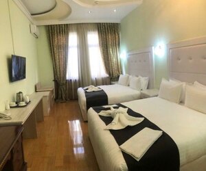 Queens Hotel (Tashkent, Kohinur street), otel  Taşkent'ten