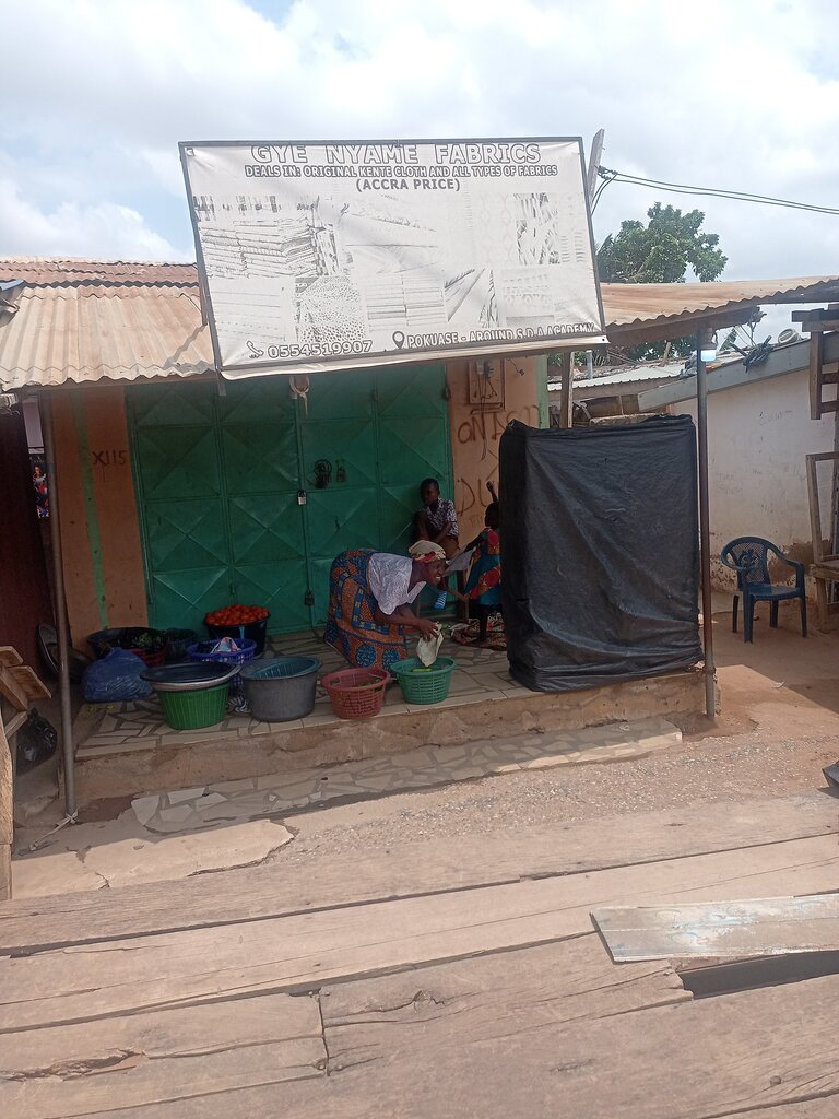 Giyim mağazası Gye nyame fabrics, Dünya, foto