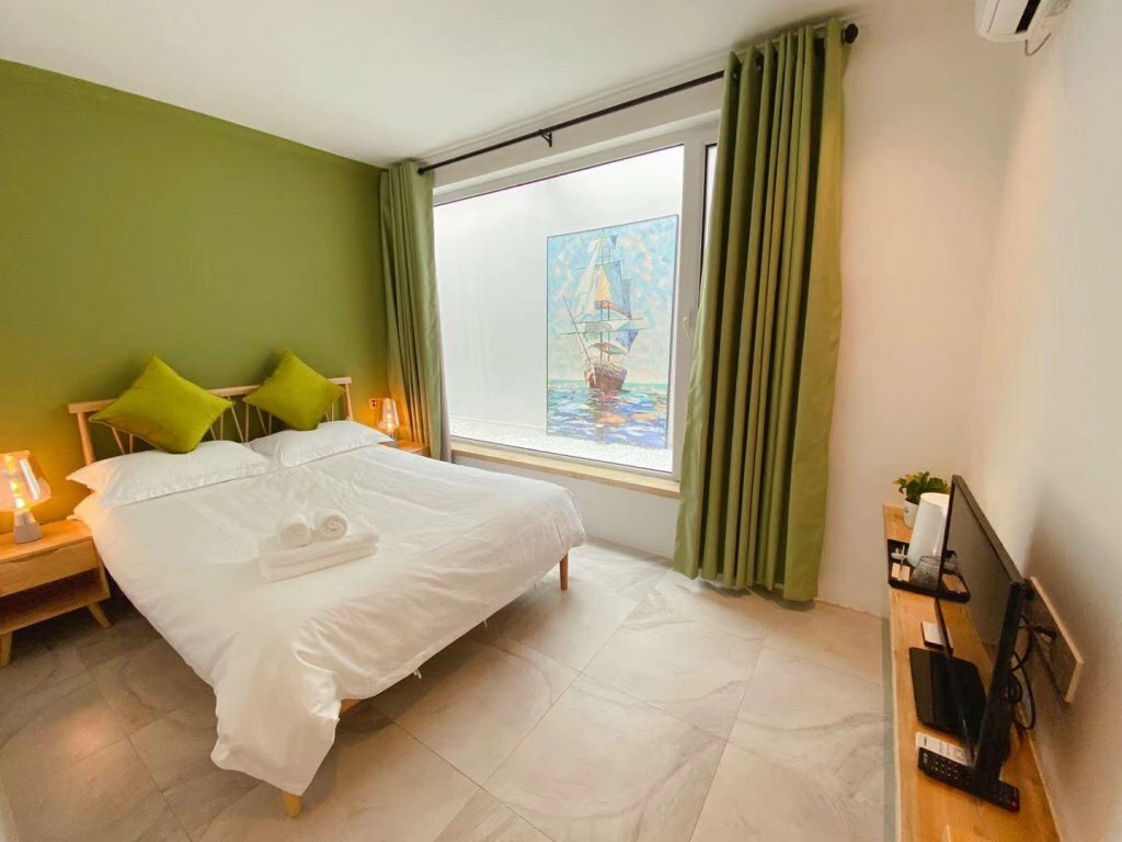 Otel Lantian Garden Hostel, Cindao, foto