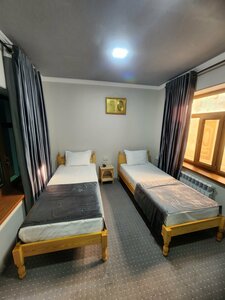 Alixan Guest House (Tagbandbafon ko'chasi No:24), otel  Buhara'dan