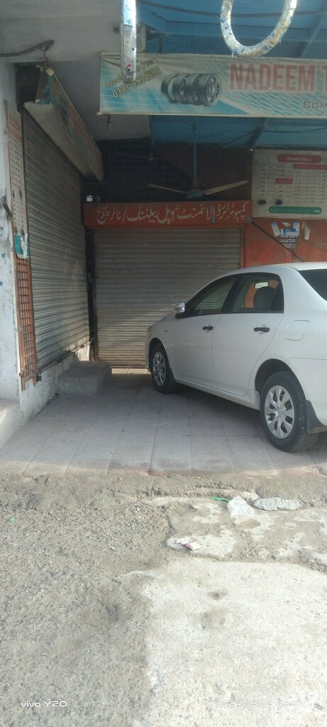 Otomobil yedek parçaları Computized alignment & wheel balancing, Islamabad, foto