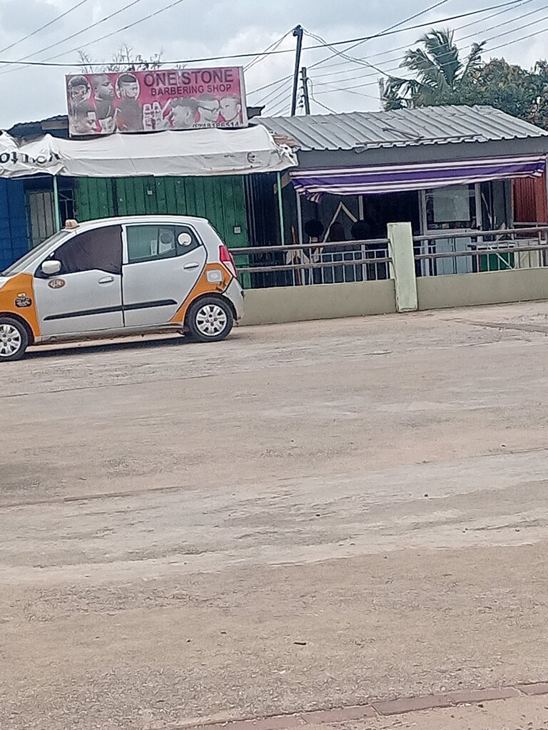 Berberler One stone barbering salon, Dünya, foto