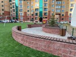 Sports ground (Khanty-Mansiysk, rayon Tsentralny), spor alanı  Hantı‑Mansi'den