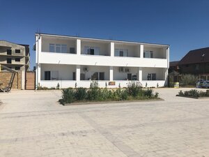 Гостевой дом Мечта (Набережная улица No:28, село Прибрежное), otel  Kırım Cumhuriyeti'nden