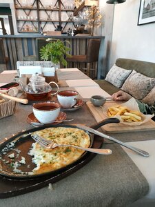 Кукарский двор (ulitsa Stroiteley No:35, Sovetsk), kafe  Sovetsk'ten