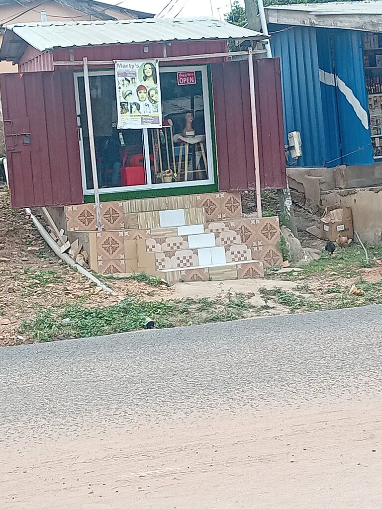 Kuaförler Marty's salon, Dünya, foto