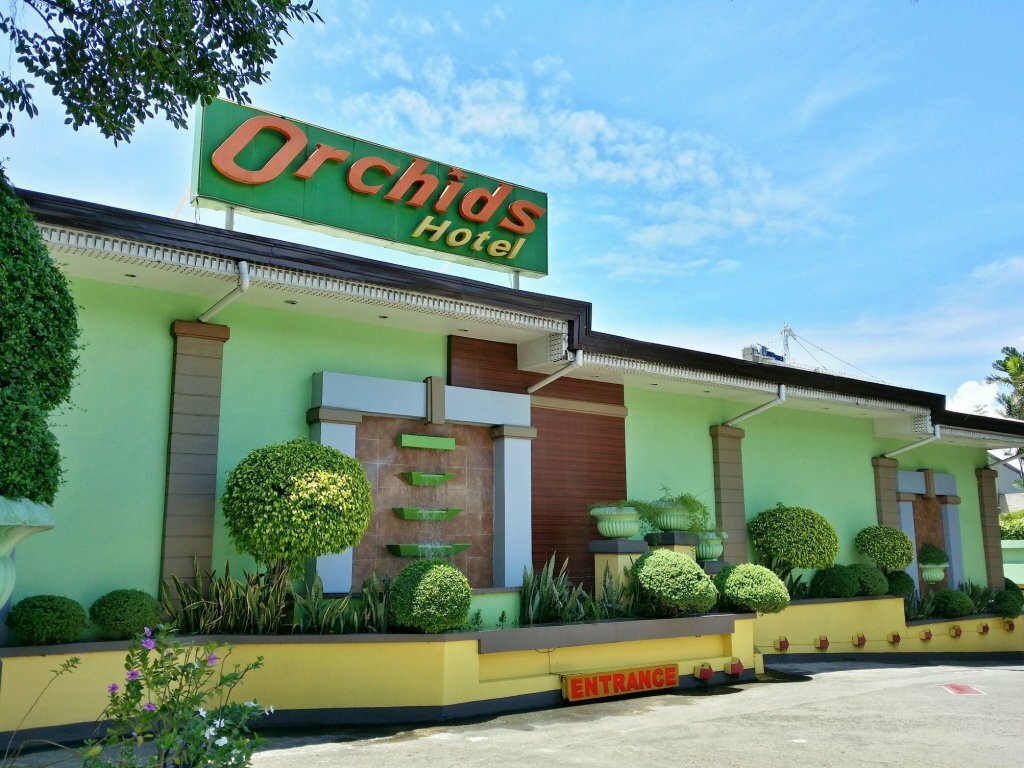 Otel Orchids Drive Inn Hotel and Restaurant, Dünya, foto