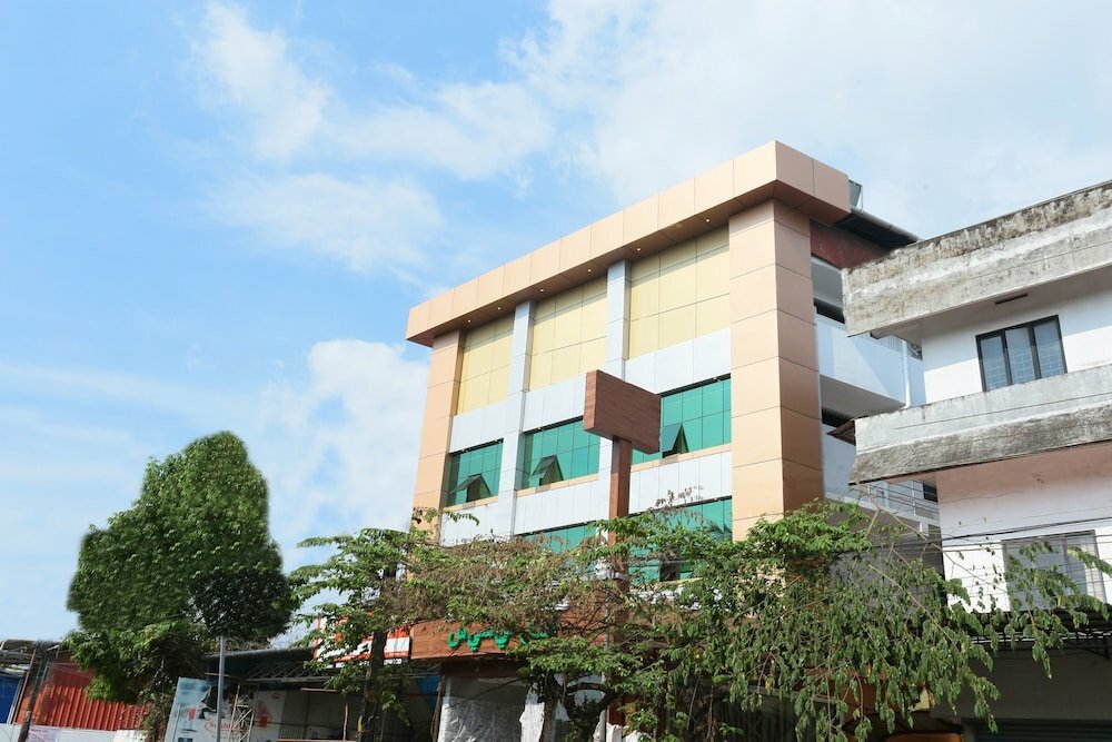 Otel Capital O 22485 Tcs Suites, Kerala, foto