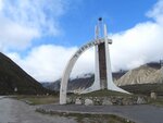 Тырныауз (Kabardino-Balkarian Republic, Elbrusskiy District, A-158, uchastok Baksan - Elbrus, 54-y kilometr), giriş işareti  Tyrnauz'dan
