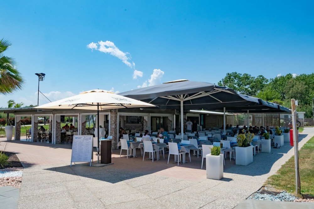 Otel Camping Oasi, Dünya, foto