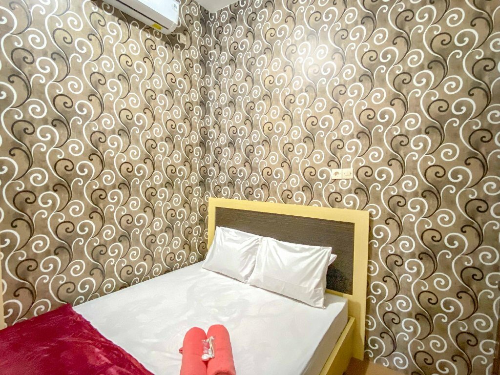 Otel Tini's Guest House Malang RedPartner, Malang, foto