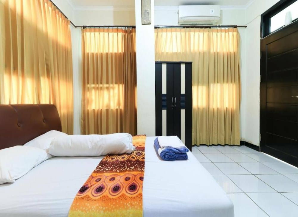 Otel Ratu Guesthouse, Dünya, foto