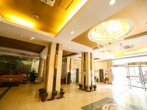 Q+ Hua Qiao Hotel (Hubei Province, Jingmen City), otel  Jingmen'den
