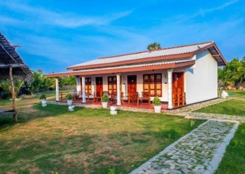 Otel Esha Beach Resort, Dünya, foto