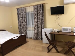 Guest House Yug (ulitsa Chapayeva No:24А, khutor Staraya Stanitsa), otel  Rostovskaya oblastından