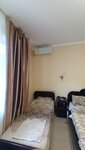 Central İnn (Kalarasha Street No:125, Lazarevskoe Residential District), otel  Soçi'den