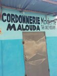 Cordonnerie moderne Malouda (Brazzaville, Commune de Kintélé Centre), ayakkabı tamiri  Brazzaville'den