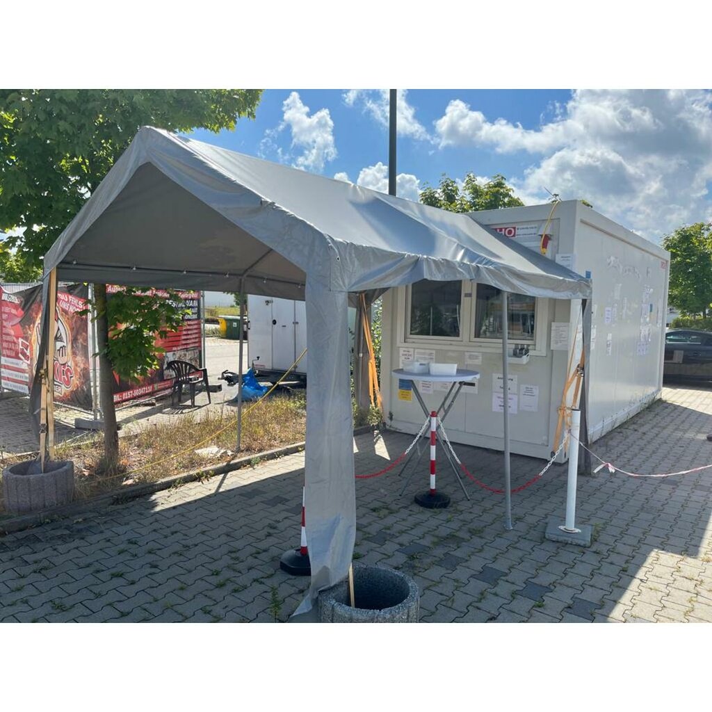 Tıbbi danışmanlık hizmetleri Covid-Bayern Teststelle Denkendorf, Rewe Nowak Parkplatz, Bavyera, foto