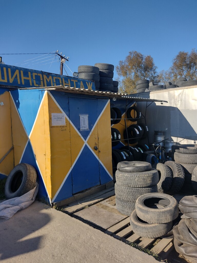 Oto lastik tamiri Tire fitting and repair, Magadan Bölgesi, foto