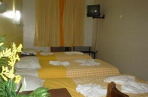 Icamiaba Hotel (Rio de Janeiro, Município do Rio de Janeiro, Rua O Tempo e o Vento, 476), otel  Belem'dan
