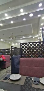 BBQ yard (Kyshtoobayev Street No:2), kafe  Karakol'dan