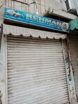 Rehman Estate Agency and Rent A Car (Neelum Block Service Road No:689, Allama Iqbal Town, Neelam Block), oto kiralama  Lahor'dan