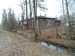Дореволюционный дом с наличниками (Sosnovskiy Avenue No:4к1К), turistik yerler  Saint‑Petersburg'dan