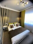 AlexhOtel (ulitsa Gorkogo No:18А), konuk evi  Sharypovo'dan