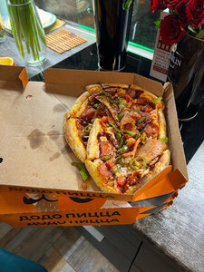 Dodo Pizza (Sovremennikov Street No:17/2, posyolok Novogorelovo), pizzacılar  Saint‑Petersburg ve Leningradskaya oblastından