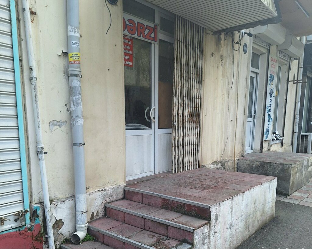 Kıyafet tamiri Dərzi, Bakü, foto