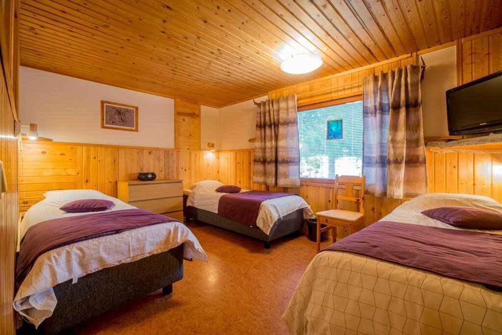 Otel Ylls Log Cabins, Lappi, foto