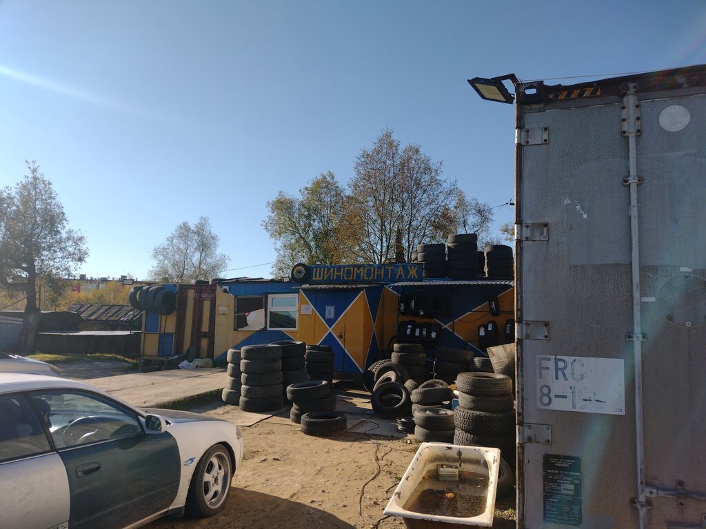 Oto lastik tamiri Tire fitting and repair, Magadan Bölgesi, foto