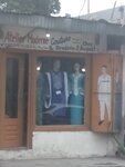 Atelier moderne de couture chez O. August (Brazzaville, Commune de Poto-Poto, Rue Mbochi), moda evleri  Brazzaville'den