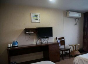 Ejea Hotel Central Station (Jiangsu Province, City of Wuxi), otel  Wuxi'den