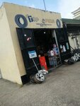 Top pneus (Brazzaville, Commune de Moungali, Lagué Rue), oto lastik tamiri  Brazzaville'den