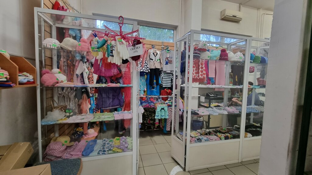Çocuk giyim mağazaları Отдел детской одежды, Krasnoyarsk, foto
