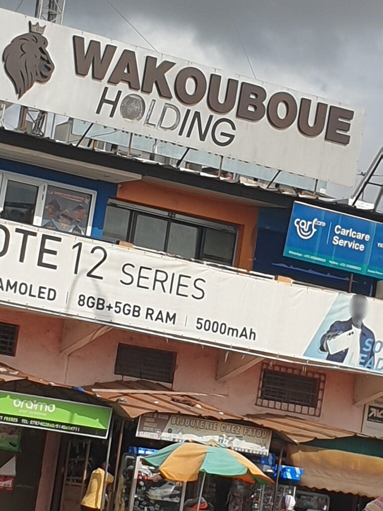 Alışveriş merkezleri Wakouboue Shopping Center, Abican, foto