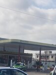 X Oil Congo (Brazzaville, Avenue des Trois Martyrs), benzin istasyonu  Brazzaville'den