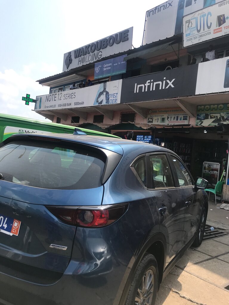 Alışveriş merkezleri Wakouboue Shopping Center, Abican, foto