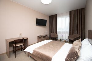 Grand (No:51А, rayon Yuzhnaya Zhilaya Chast, mikrorayon Montazhnikov, Noviy Urengoy), otel  Novy Urengoy'dan