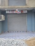Sandy's Collections (Theodosia Okoh Road No:47), giyim mağazası  Akra'dan