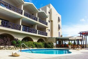 Infinity On The Beach (Christ Church), otel  Dünya'dan