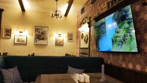 Uyut (Alleynaya ulitsa No:4, Pechory), kafe  Pechory'den