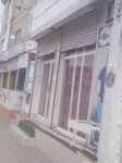 Shop (Brazzaville, Commune de Poto-Poto, Avenue Paul Doumer, 117), giyim mağazası  Kongo'dan