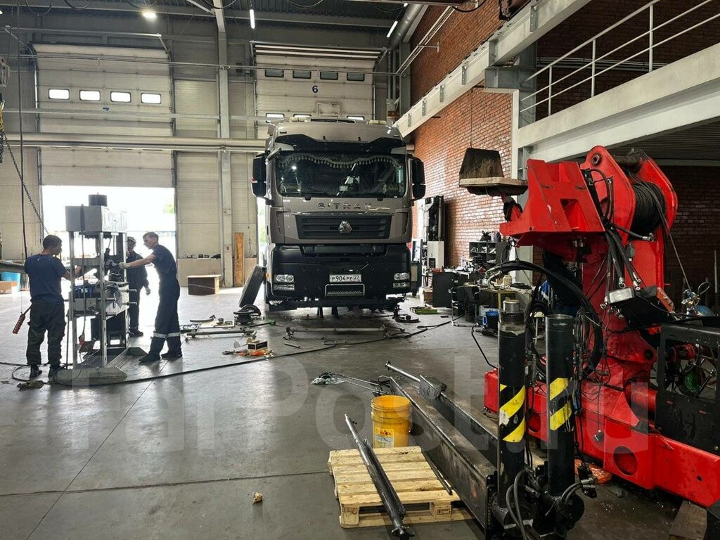 Kamyonların onarımı Граунд Машинери, Habarovsk, foto
