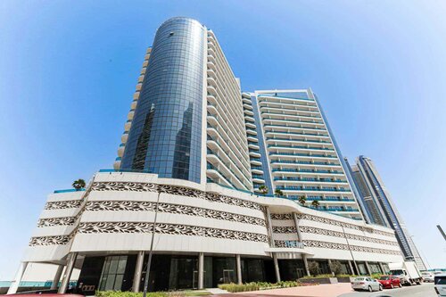 Adlandırılmış bina Sanam Building, Dubai, foto
