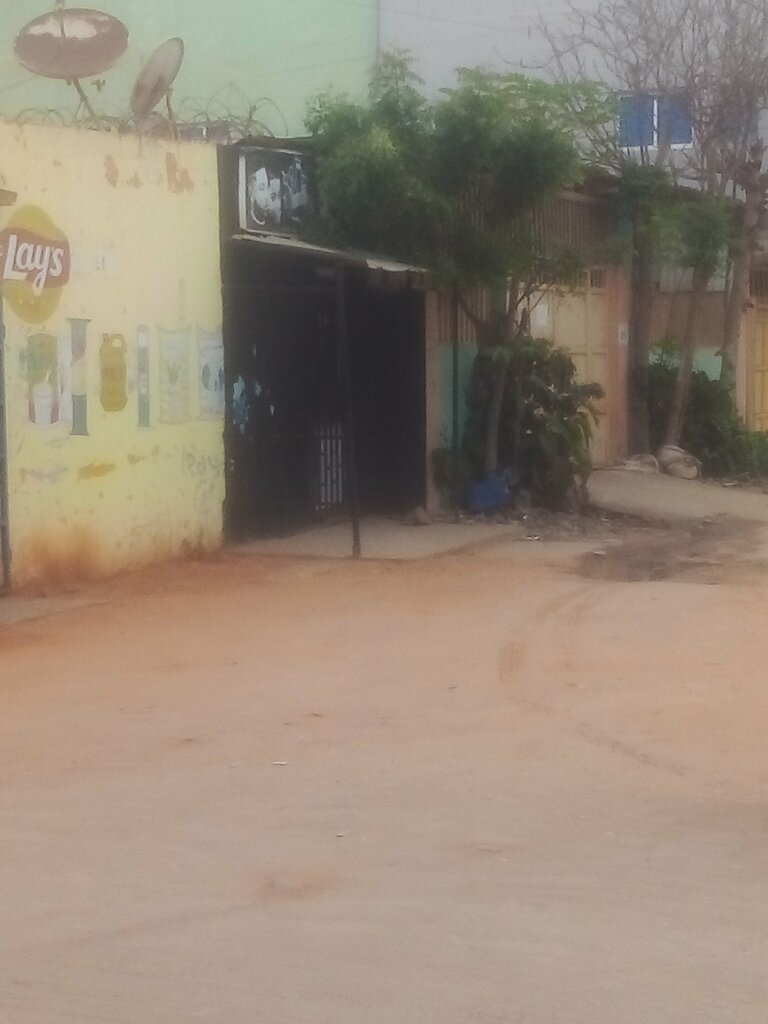 Kuaförler Minha Barbearia, Loanda, foto