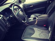 SsangYong Kyron I Рестайлинг 2.0d AT 141 л.с. 4WDдизель, полный