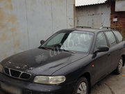 Daewoo Nubira I 1.6 MT 106 л.с.бензин, передний
